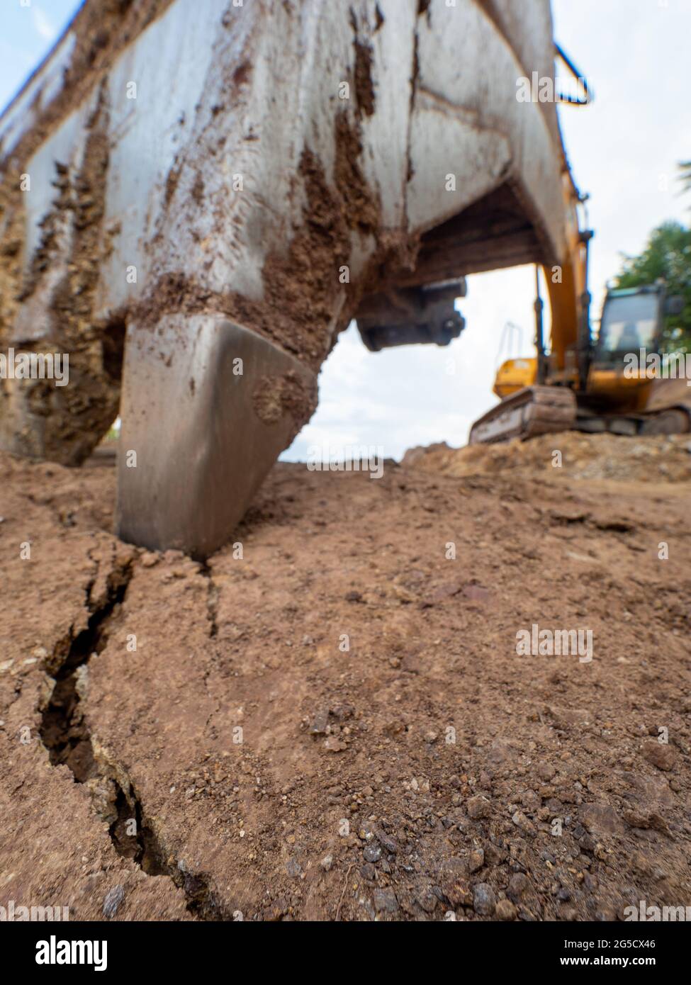 Detailed steel teeth of excavator bucket. Scarry bucket teeth ...