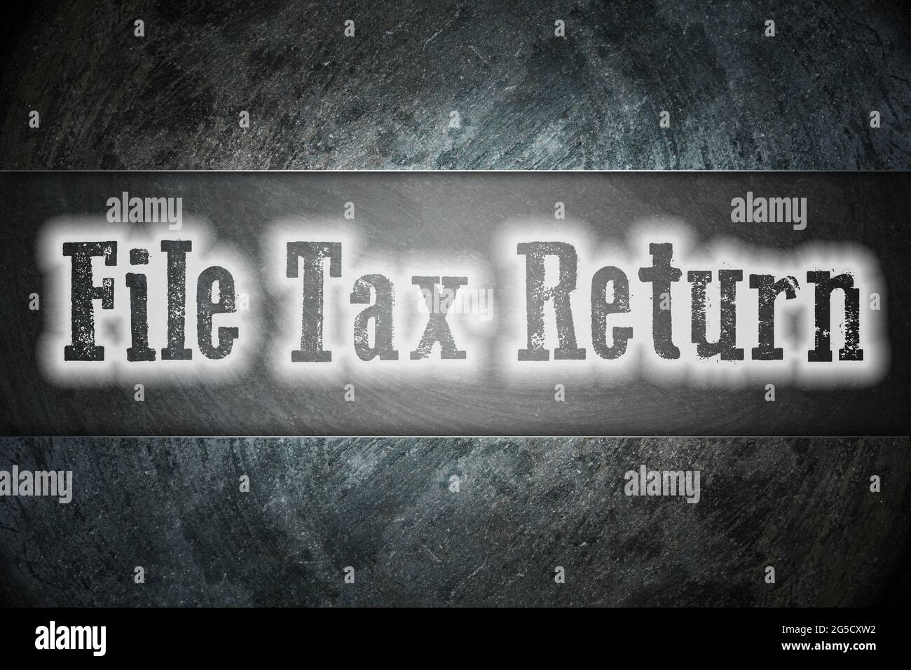 File Tax Return Concept text on background Stock Photo - Alamy