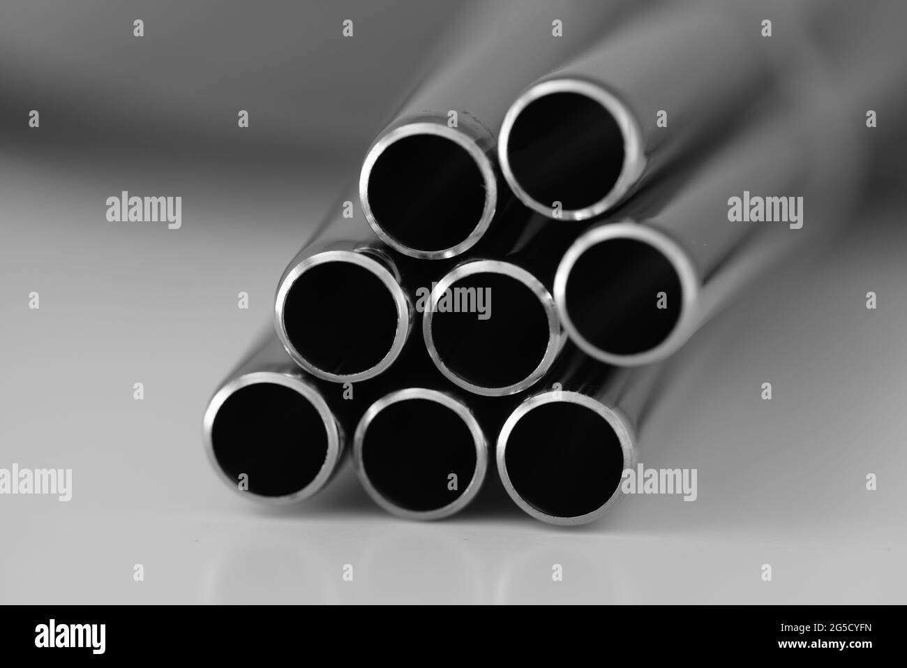 Metal pipes in a polished style used for beverages Stock Photo - Alamy