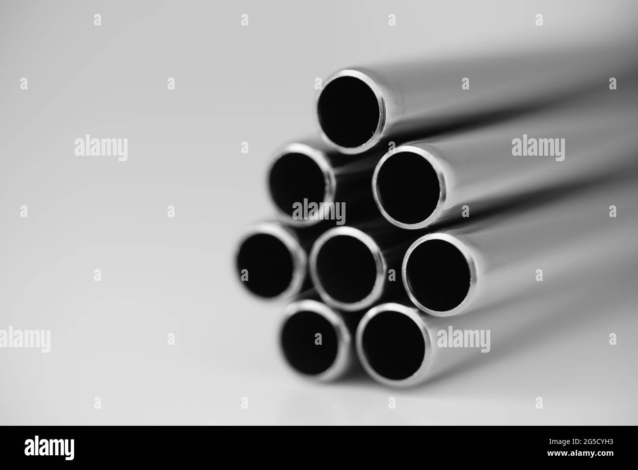 Metal pipes in a polished style used for beverages Stock Photo - Alamy