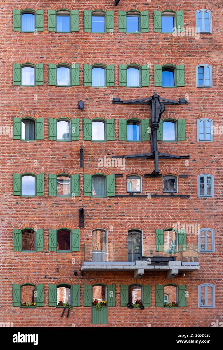 Facade of restored medieval granary on the Granary island in the old ...