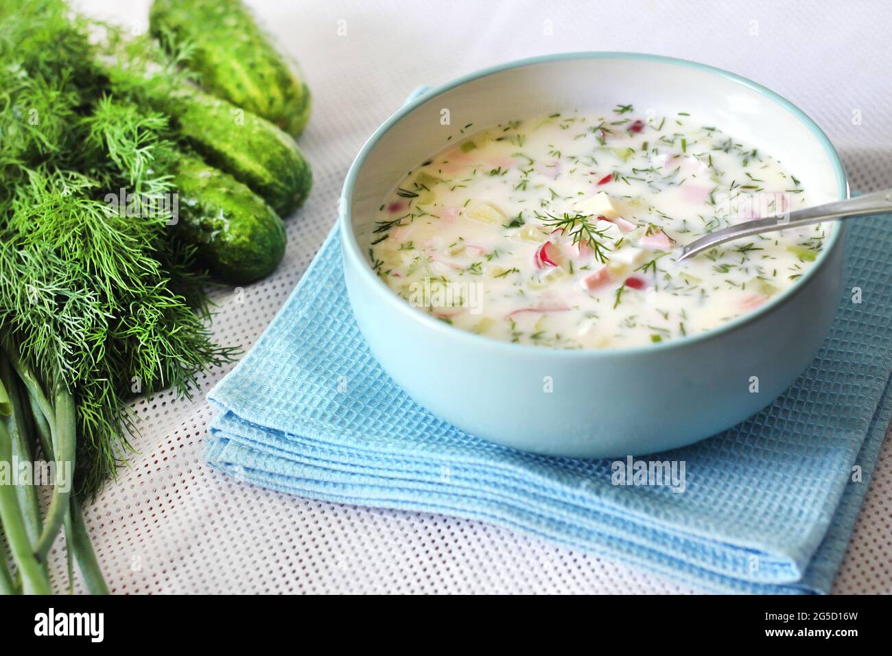 Okroshka - traditional Russian cold soup with fresh cucumber, boiled ...