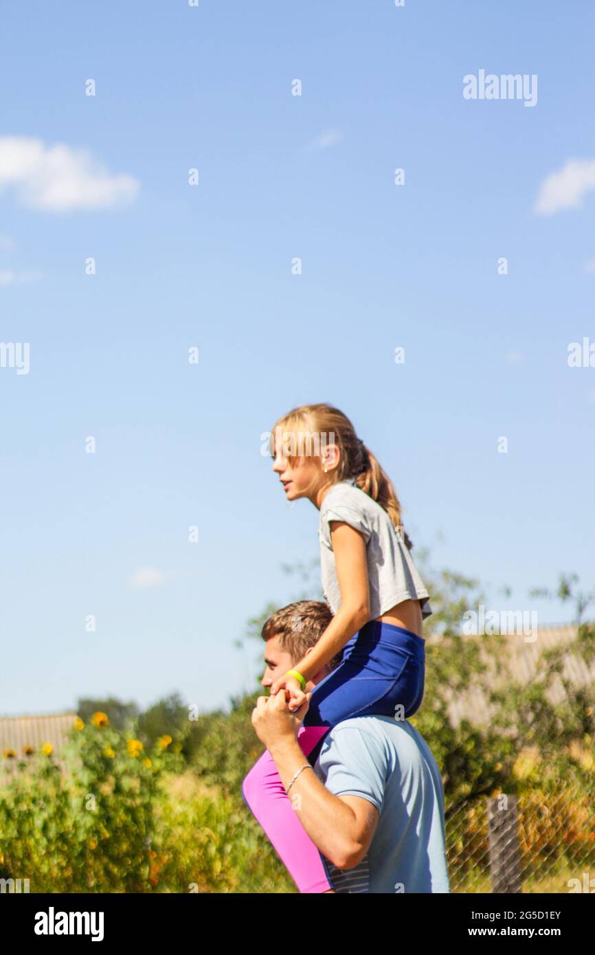 Girl riding man back hi-res stock photography and images - Alamy