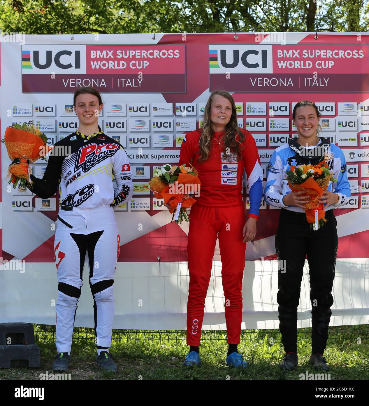 (L-R) Thalya BURFORD of Switzerland finishes first of the Women Junior ...