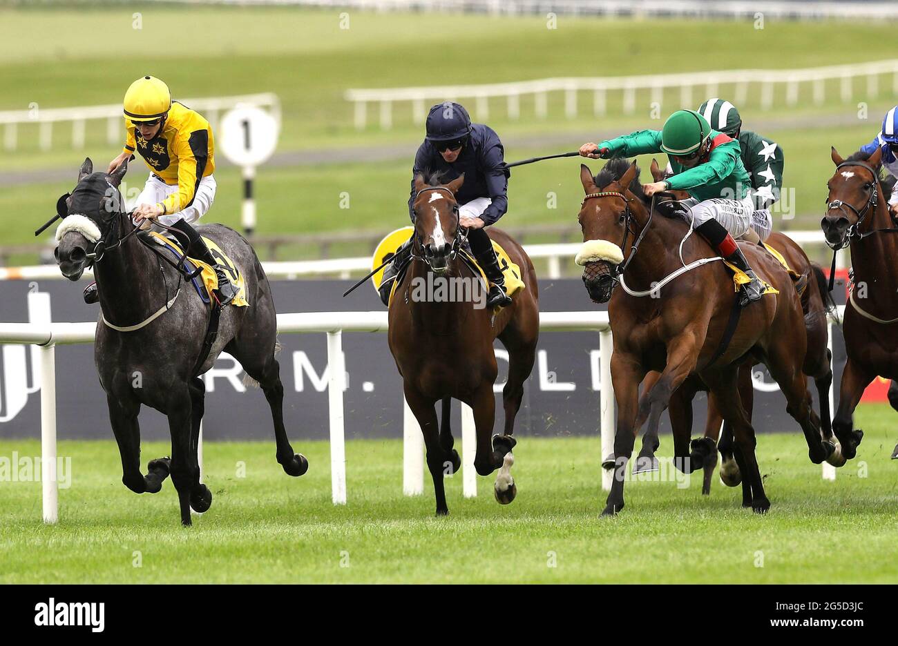 Sindhia ridden by jockey Ronan Whelan (right) wins the Dubai Duty Free ...