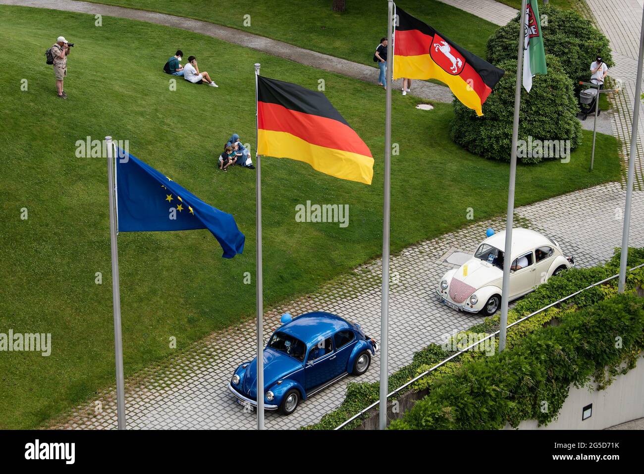 Wolfsburg, Germany. 26th June, 2021. VW Beetles of different years and ...