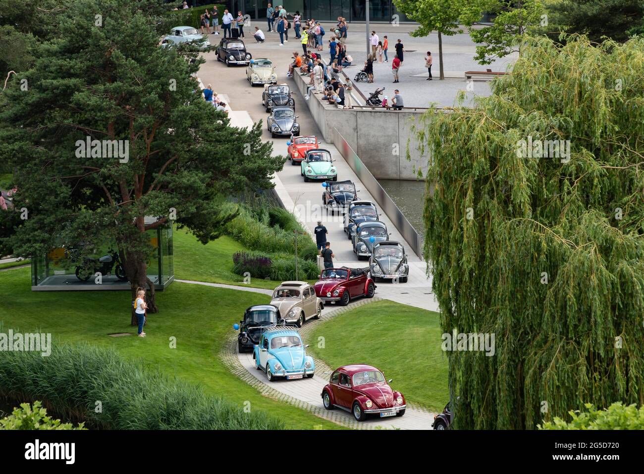 Wolfsburg, Germany. 26th June, 2021. VW Beetles of different years and ...