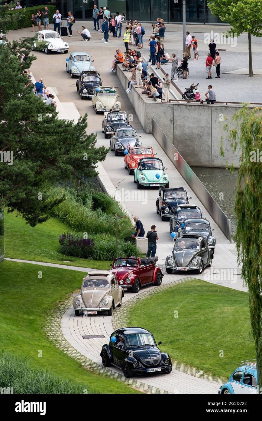 Wolfsburg, Germany. 26th June, 2021. VW Beetles of different years and ...