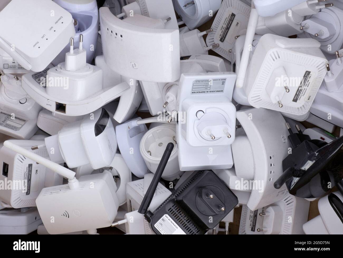 Heap of used home Wifi range extenders repeaters. Recycle wireless wi ...