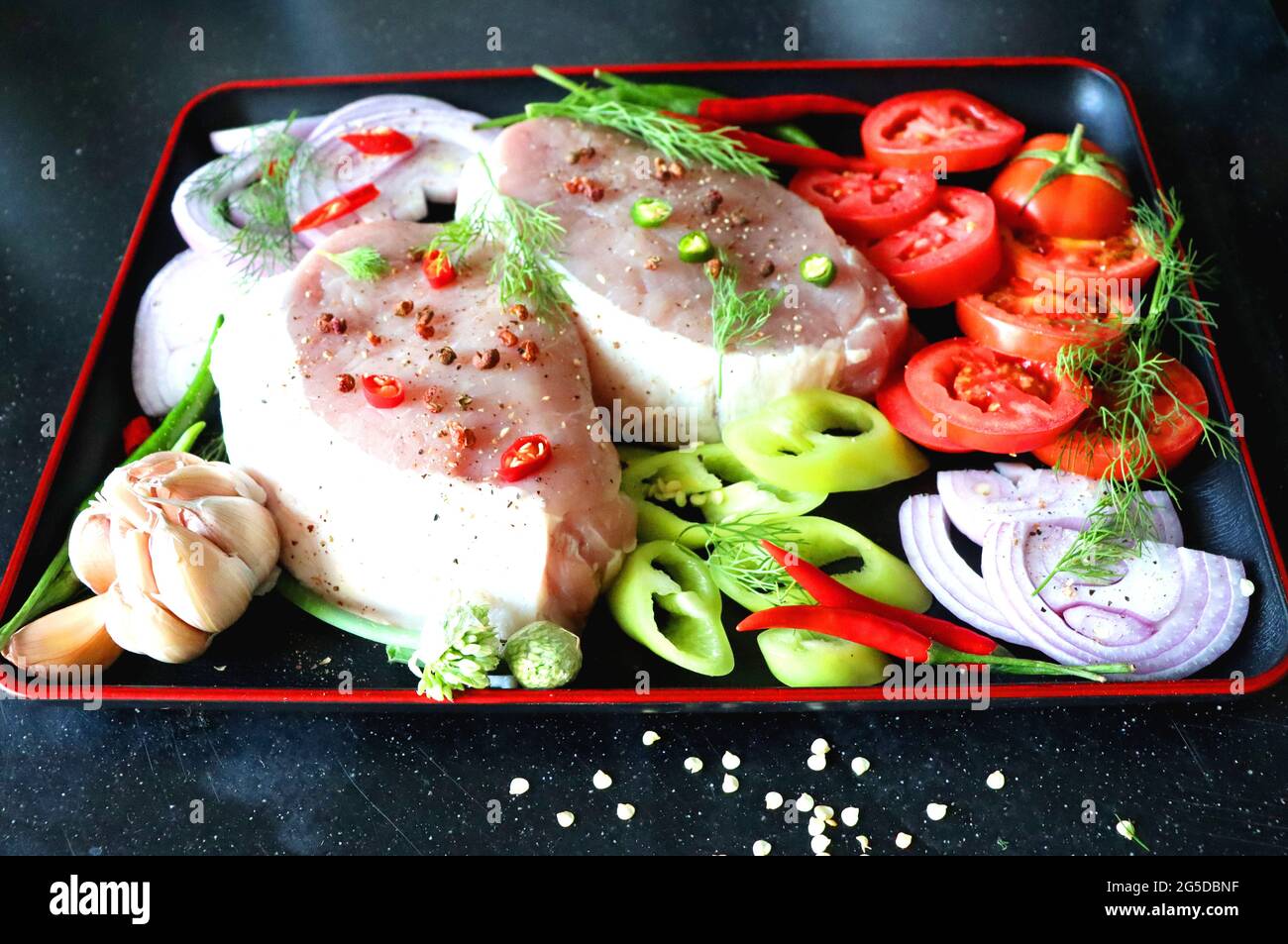 Meat with vegetables and spices, onions, red and green peppers, ginger ...