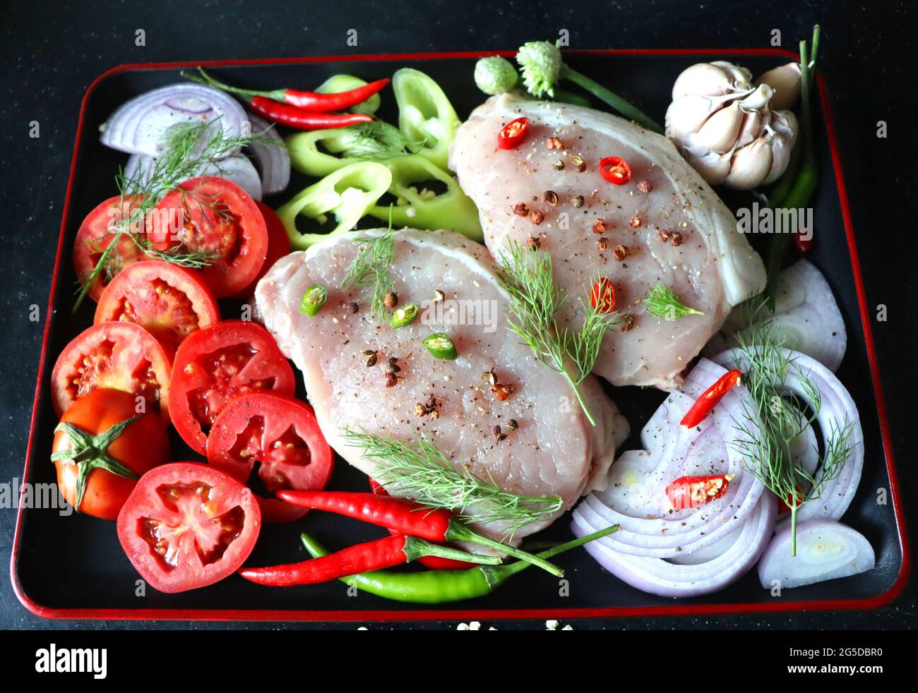 Meat with vegetables and spices, onions, red and green peppers, ginger ...