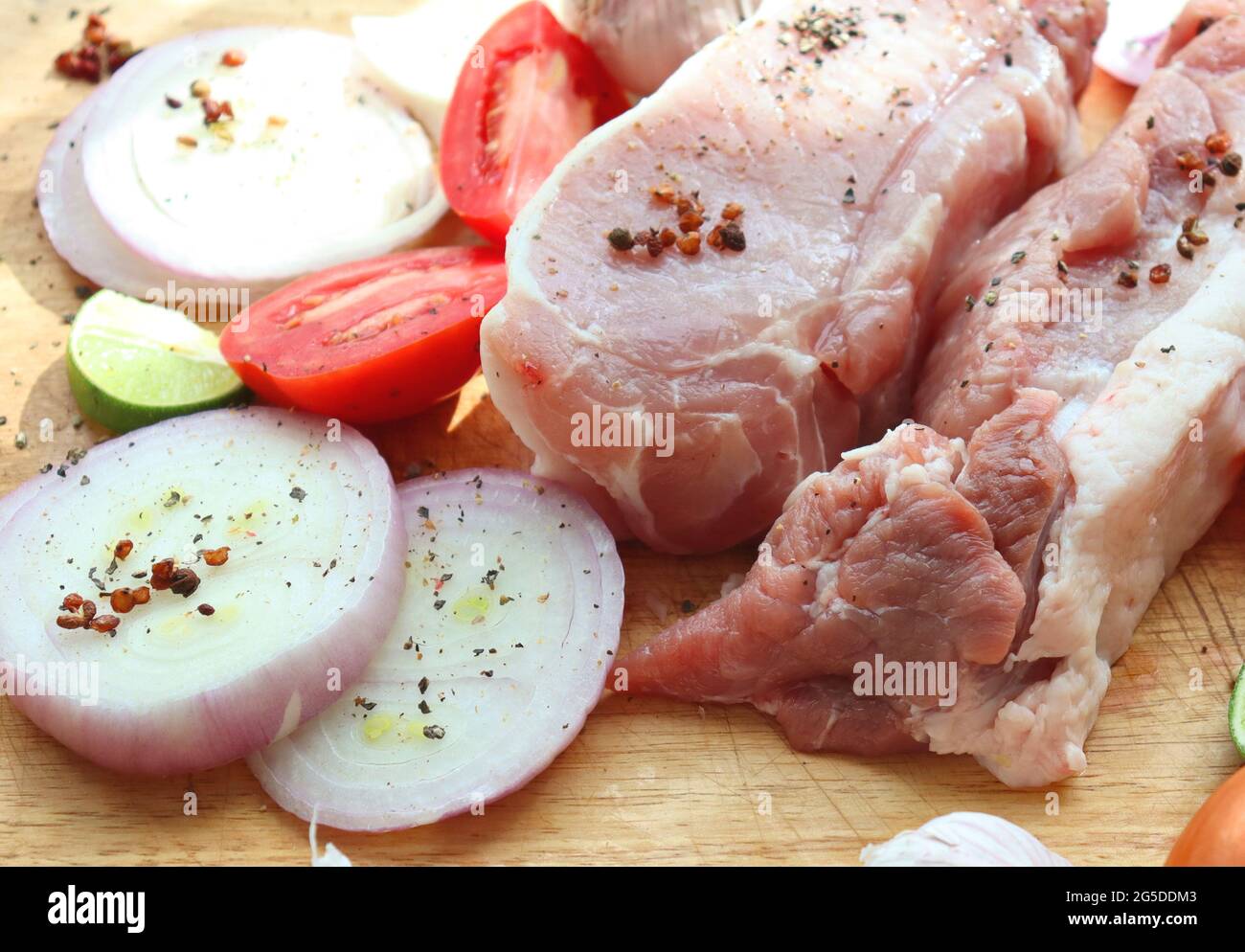 Meat with vegetables and spices, onions, red and green peppers, ginger ...