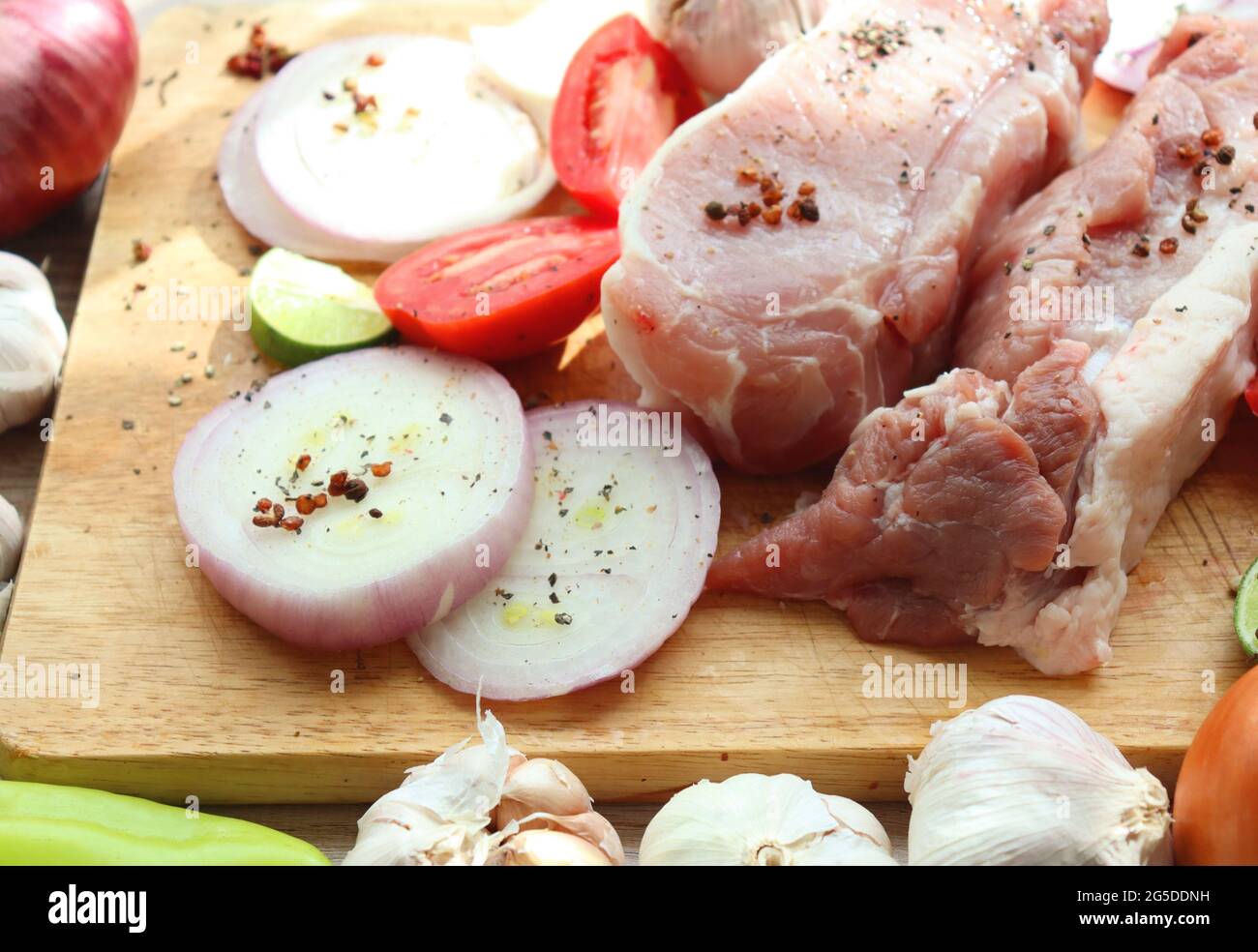 Meat with vegetables and spices, onions, red and green peppers, ginger ...