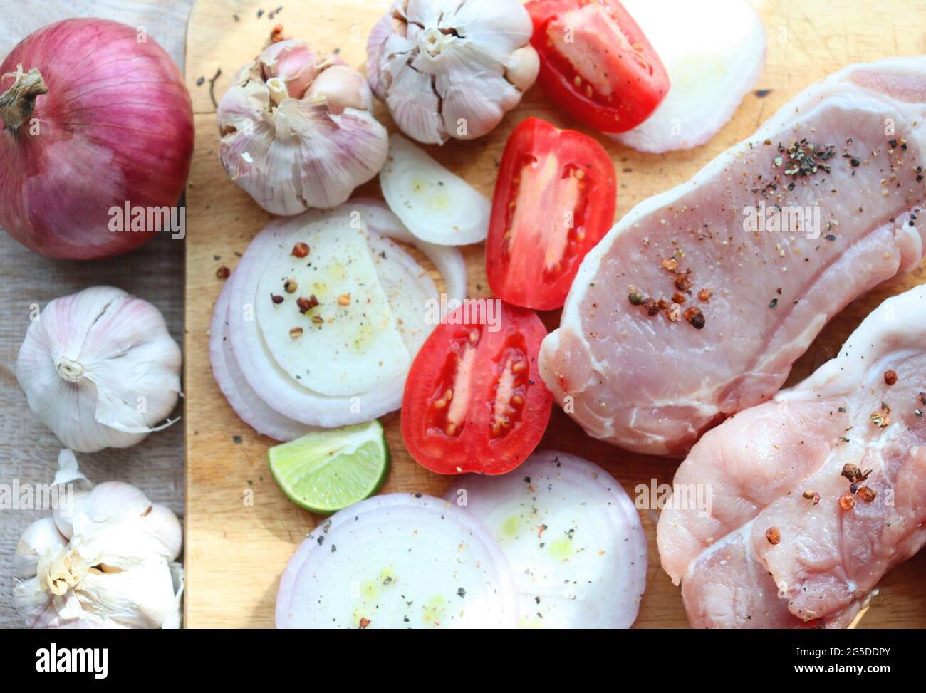 Meat with vegetables and spices, onions, red and green peppers, ginger ...