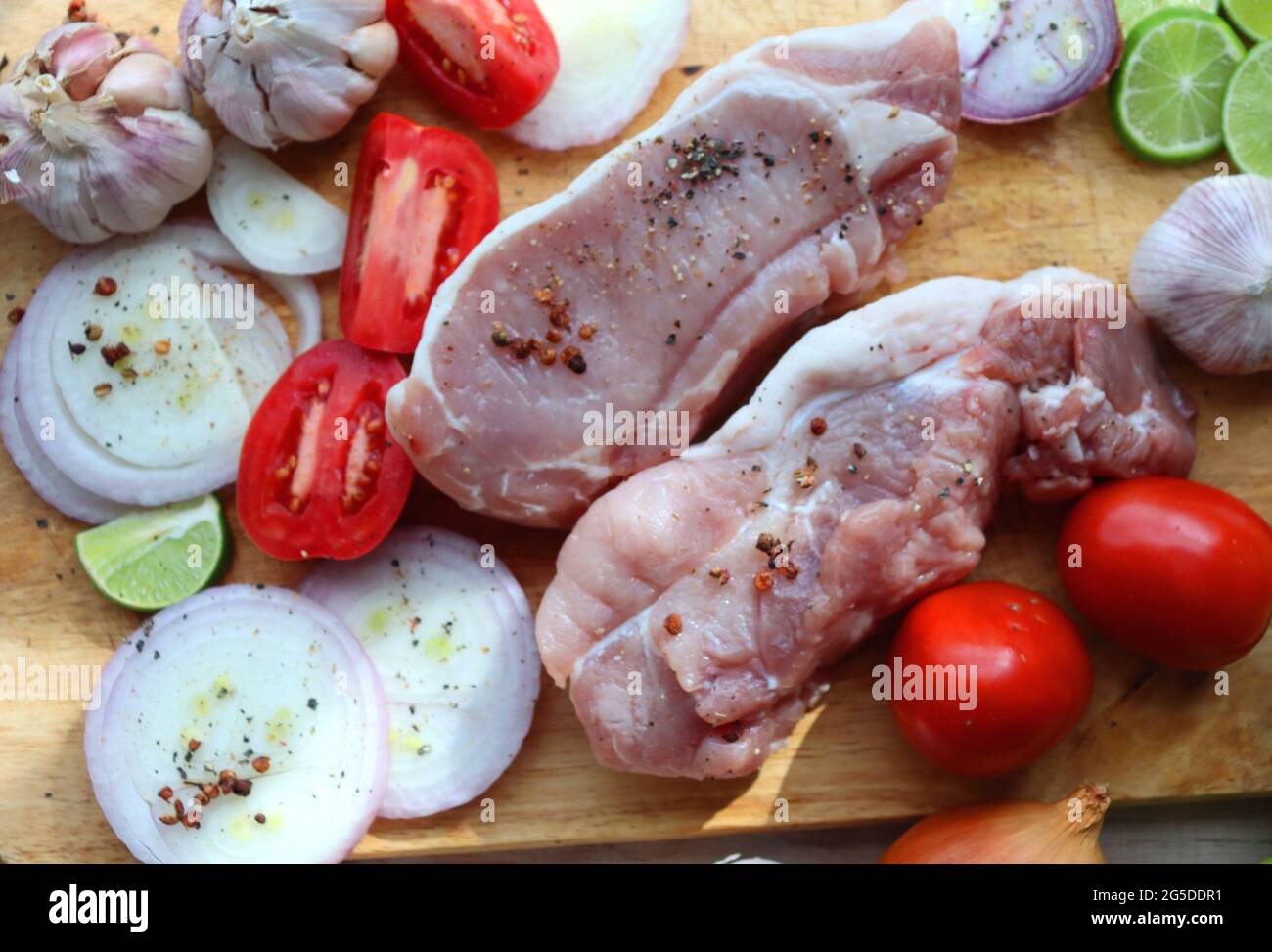 Meat with vegetables and spices, onions, red and green peppers, ginger ...