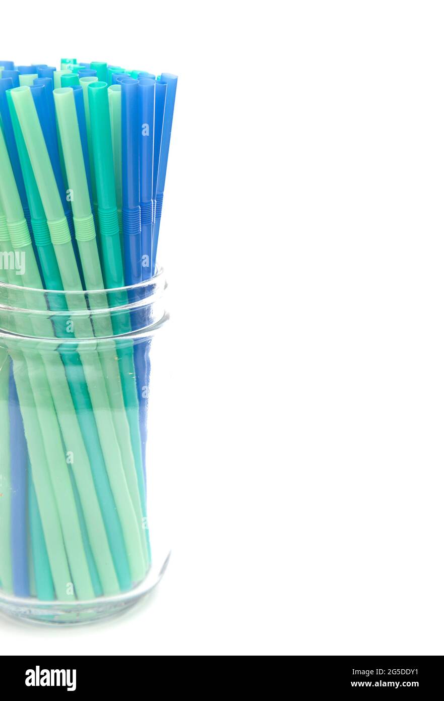 Bunch of Straws in a Glass Container on a White Background Stock Photo ...