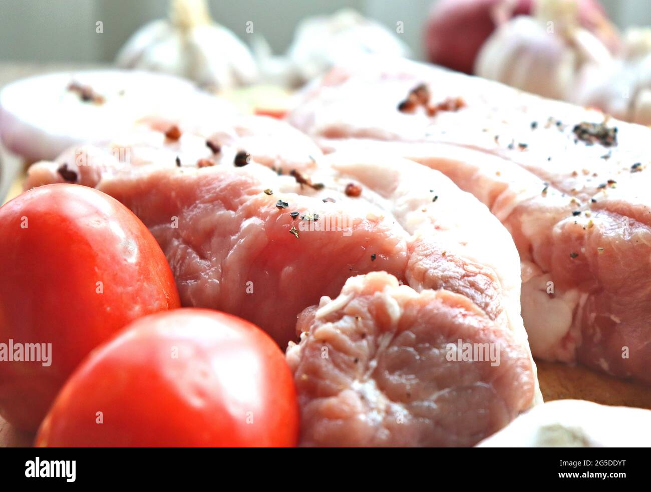 Meat with vegetables and spices, onions, red and green peppers, ginger ...