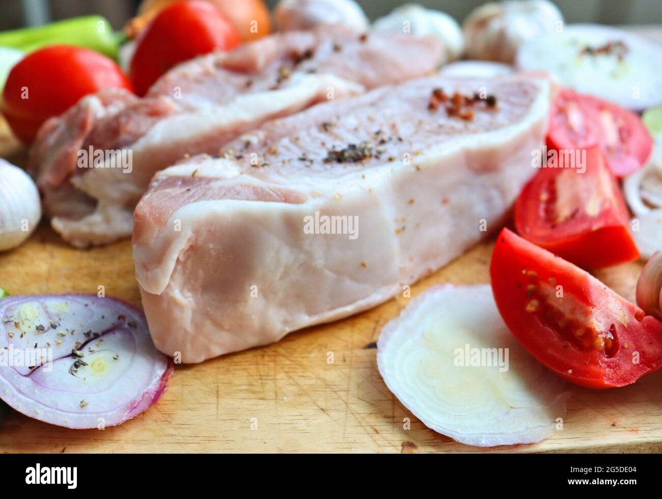 Meat with vegetables and spices, onions, red and green peppers, ginger ...