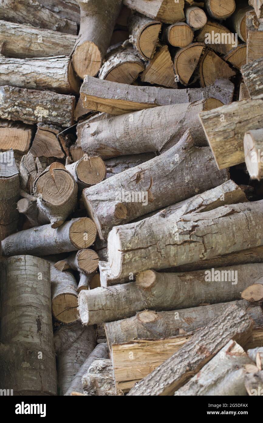 A PIle of Split Logs for a Wood Burning Fire Place Stock Photo - Alamy