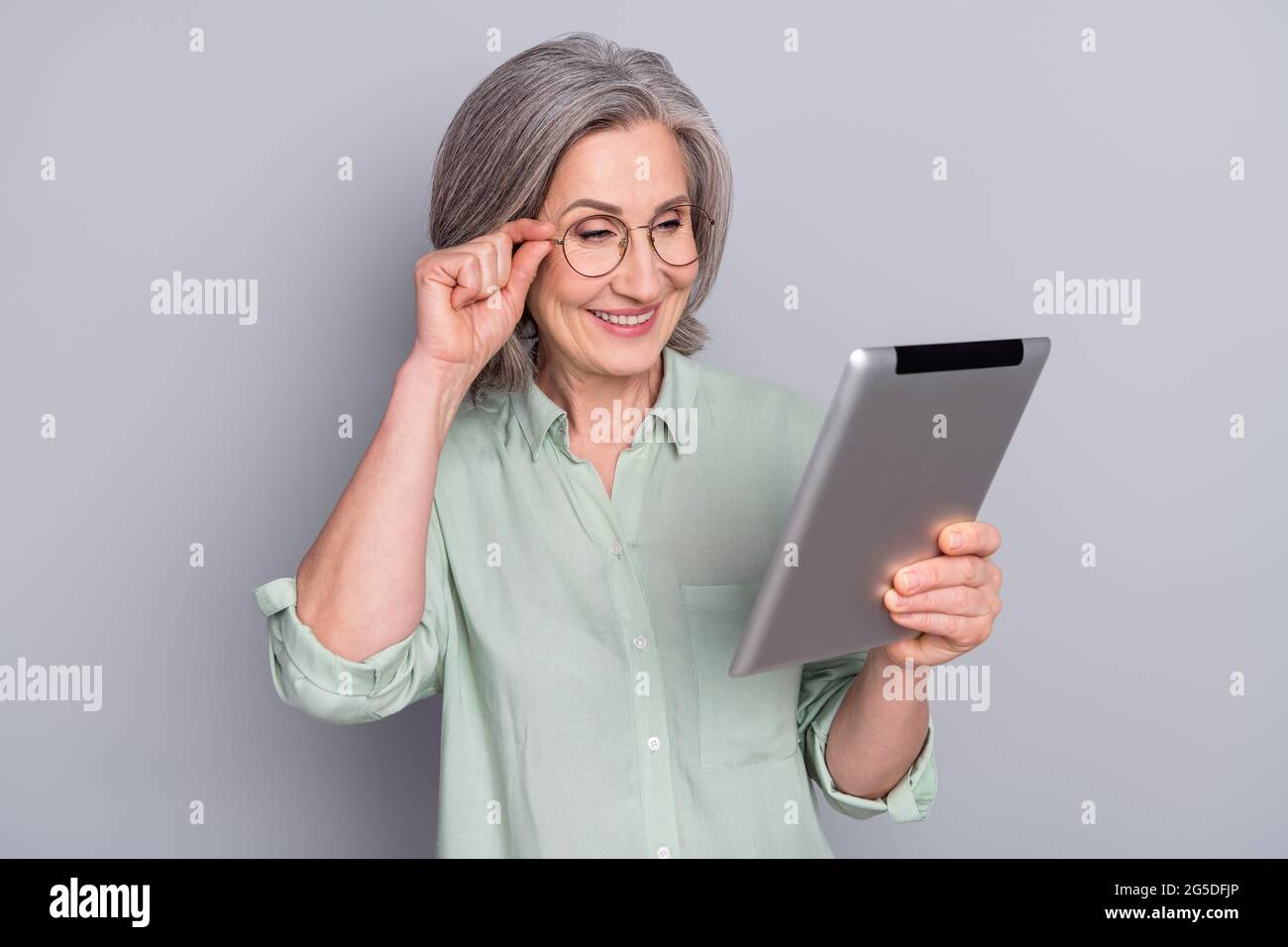 Photo of happy smiling lovely charming mature businesswoman promoter ...