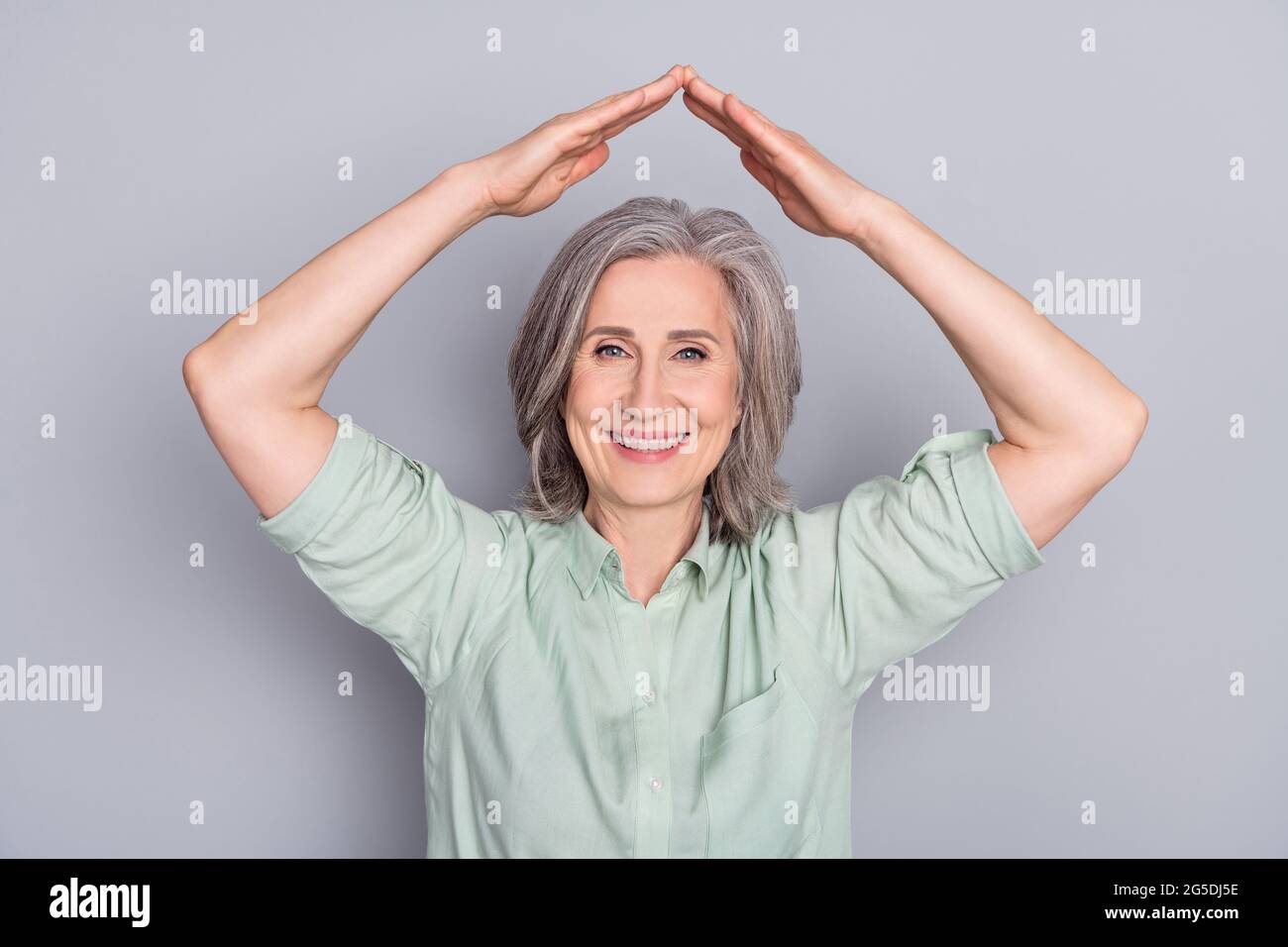Photo of happy smiling beautiful cheerful mature woman moving new house ...
