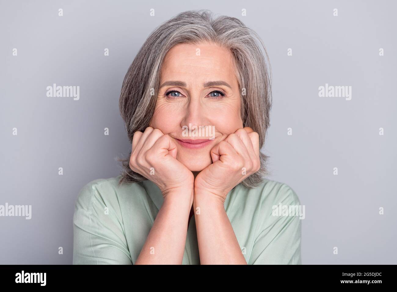 Photo of happy dreamy lovely beautiful mature woman adoring admiring ...