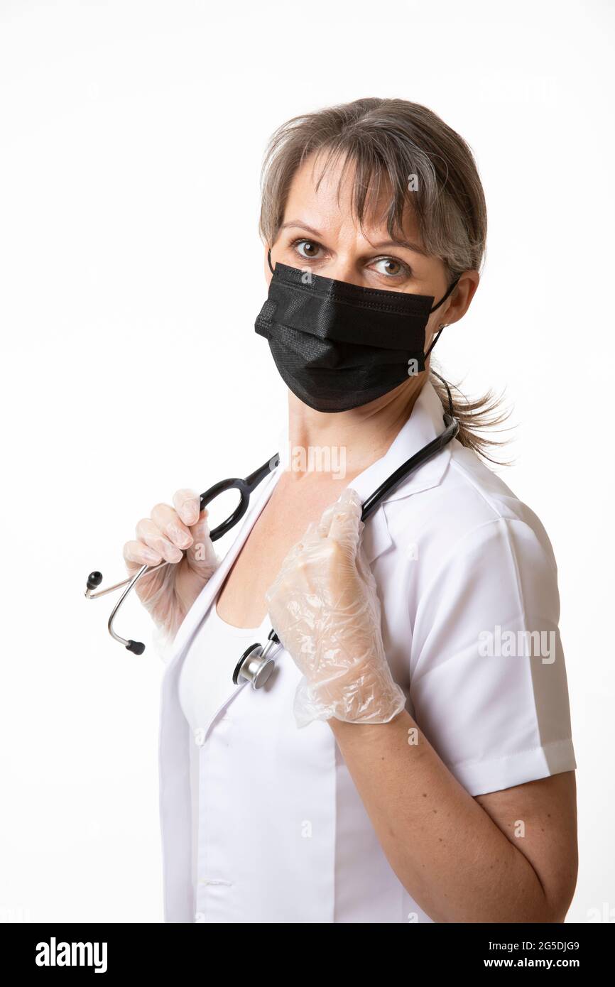 portrait of a female doctor wearinga mask Stock Photo - Alamy