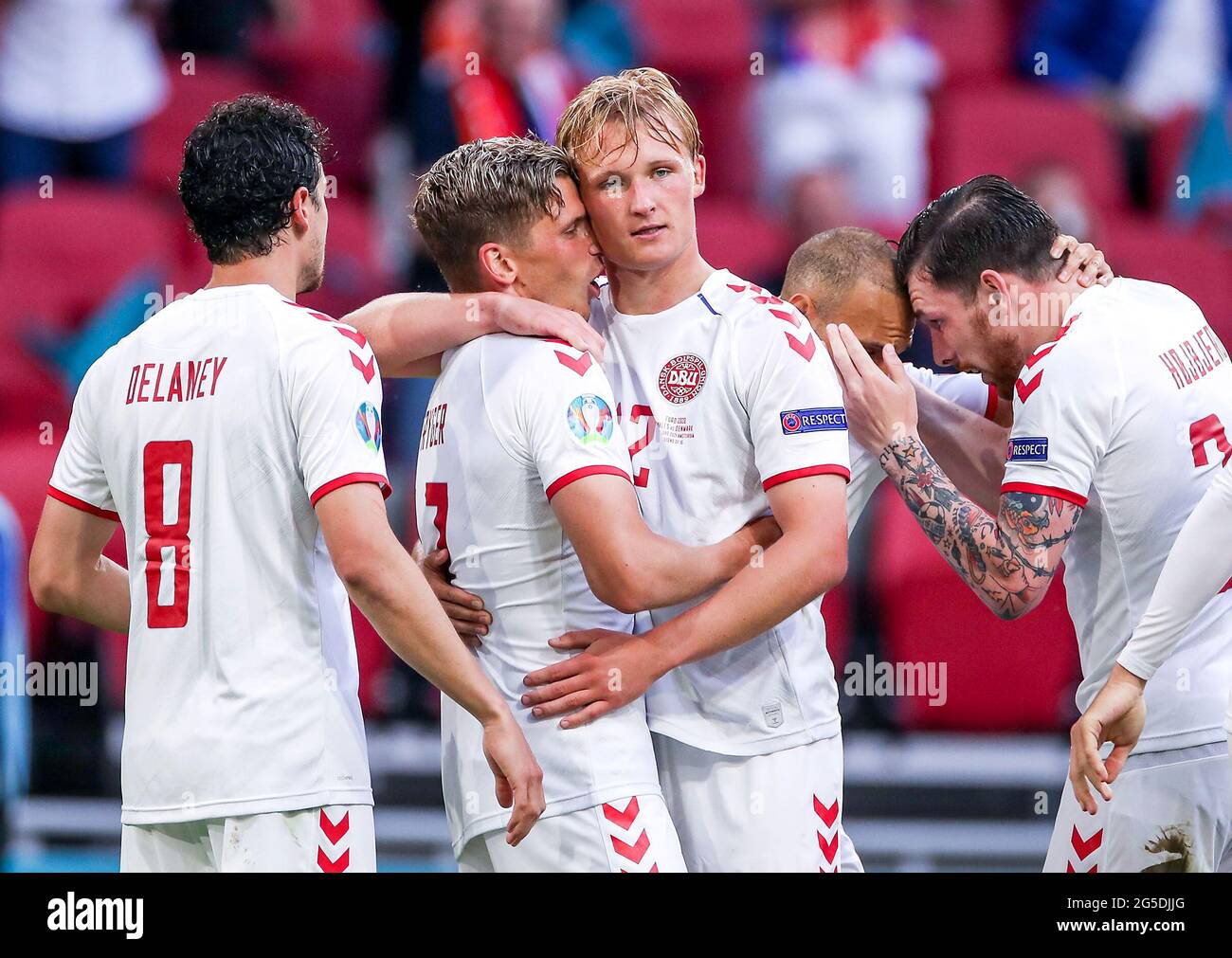 Denmark's Kasper Dolberg (centre) celebrates scoring their side's ...