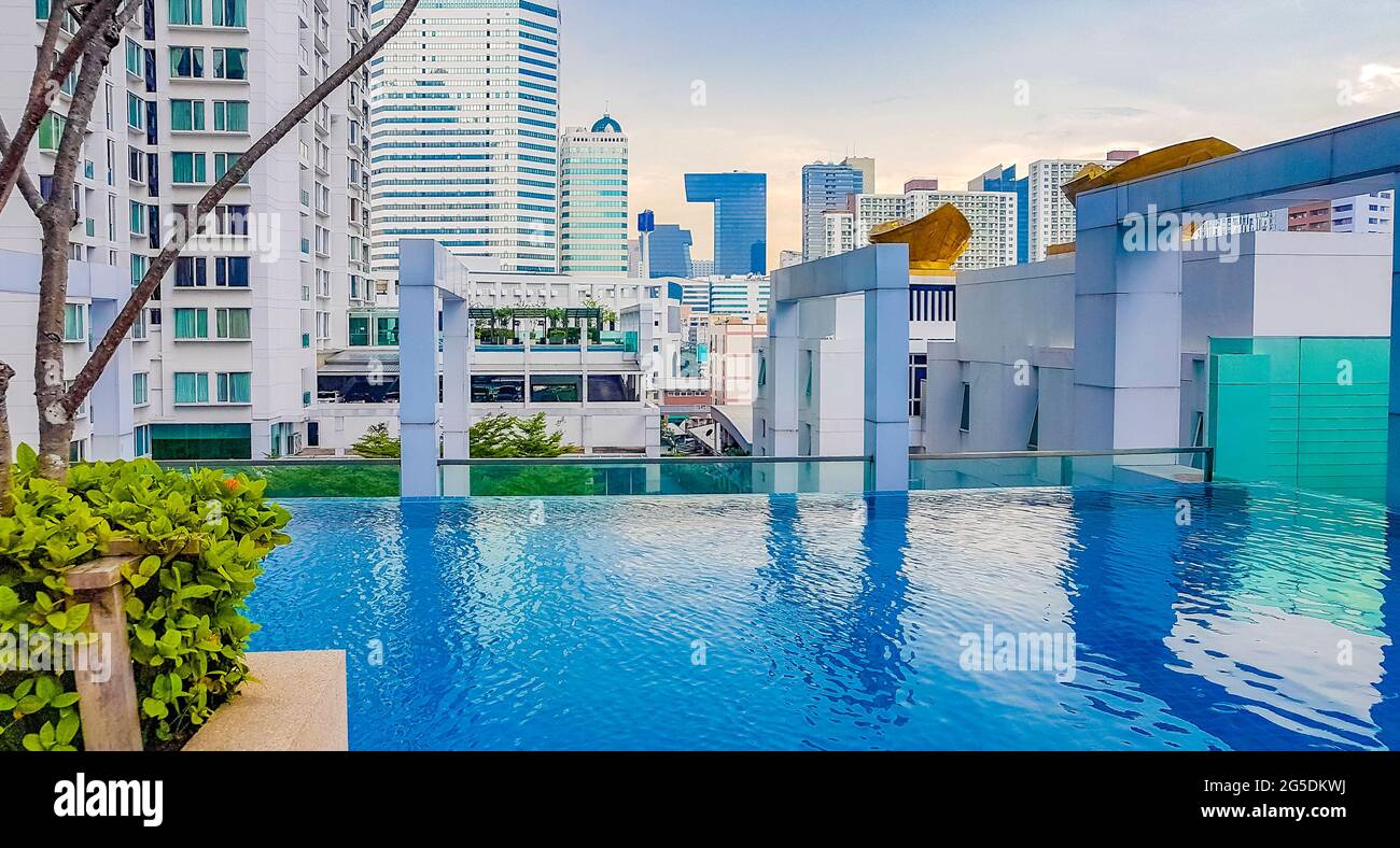 Panorama cityscape and Skyscraper view from the swimming infinity pool ...