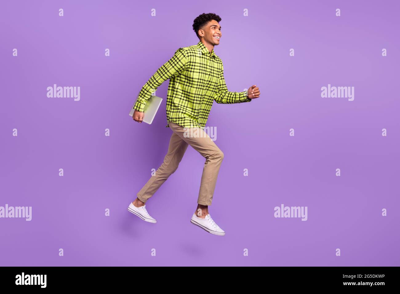 Full length body size of young jumping high running on meeting with ...