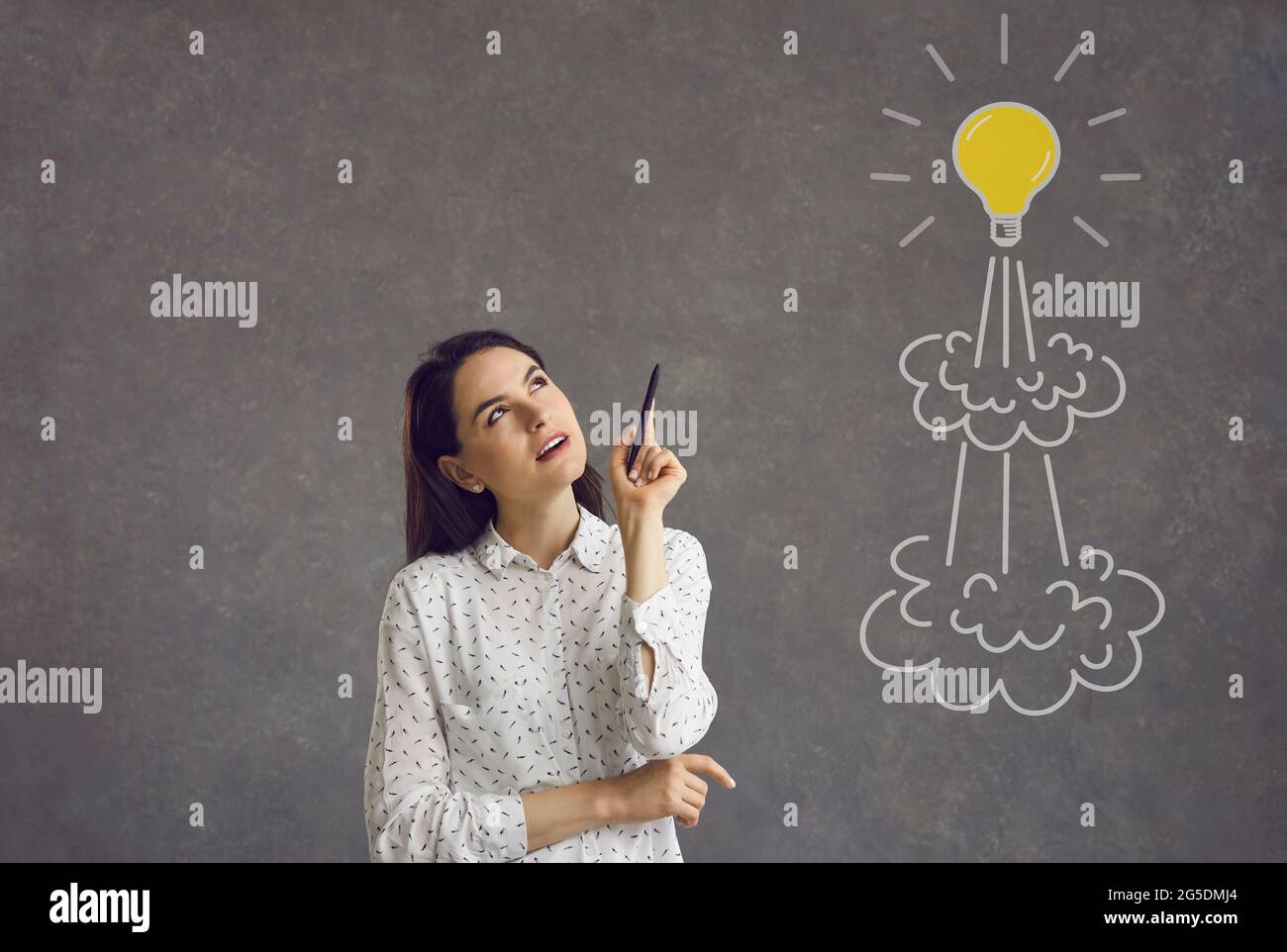 Woman light bulb thinking hi-res stock photography and images - Alamy