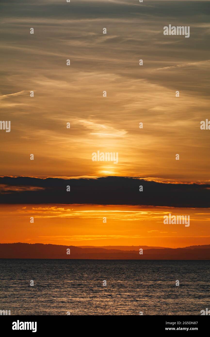 Sunset over the Bristol channel Stock Photo - Alamy