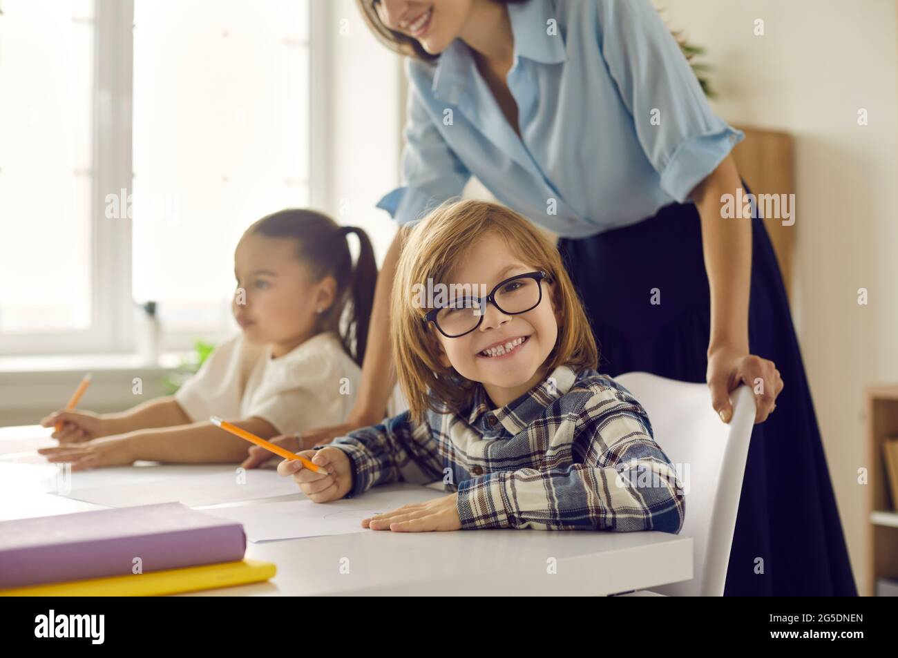 Primary school classroom with smiling children hi-res stock photography ...