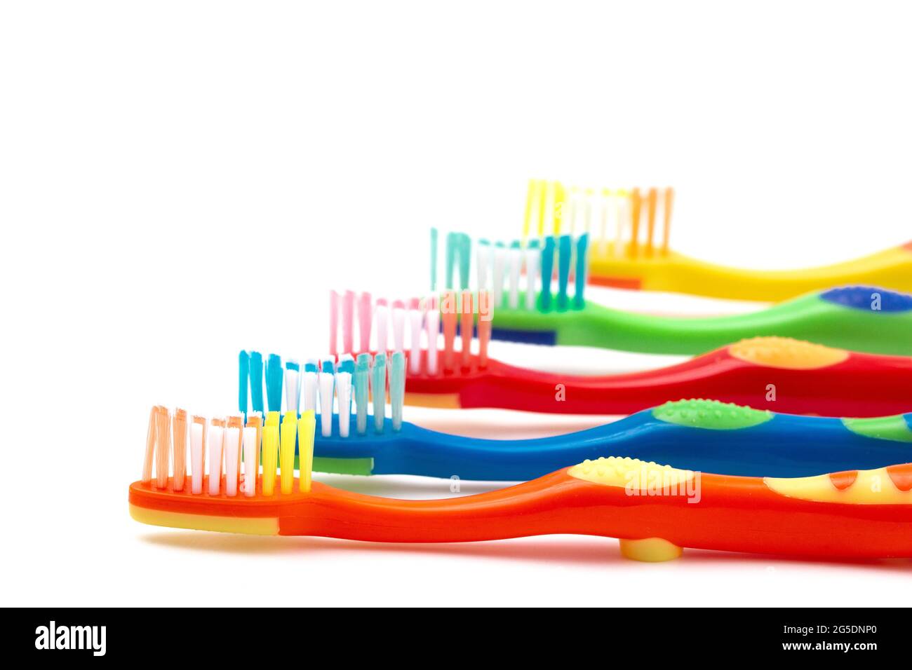 Colorful Toothbrush for Children on a White Background Stock Photo - Alamy