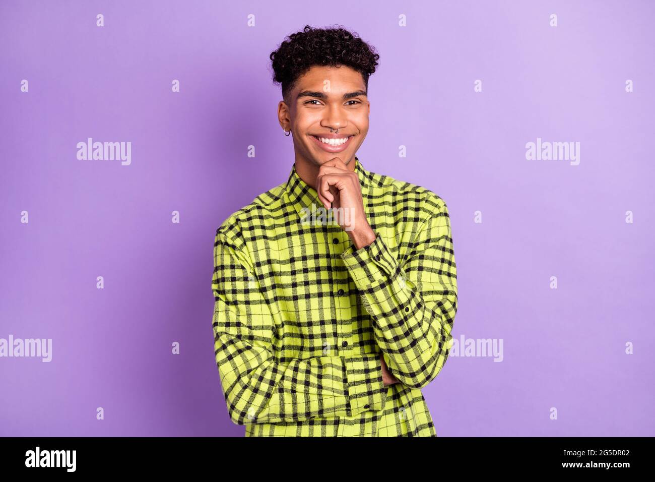 Photo of smart minded young afro american man hold hand chin smile ...