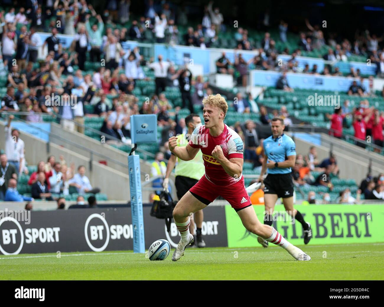 Harlequins' Louis Lynagh celebrates after scoring a try during the ...