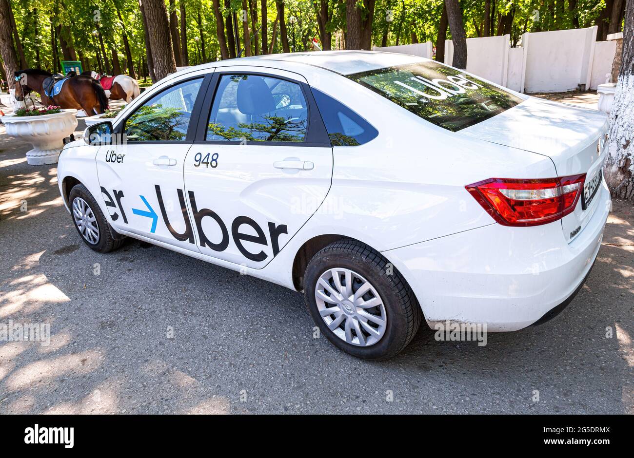 Samara, Russia - June 19, 2021: Uber taxi cab is parked on a city ...