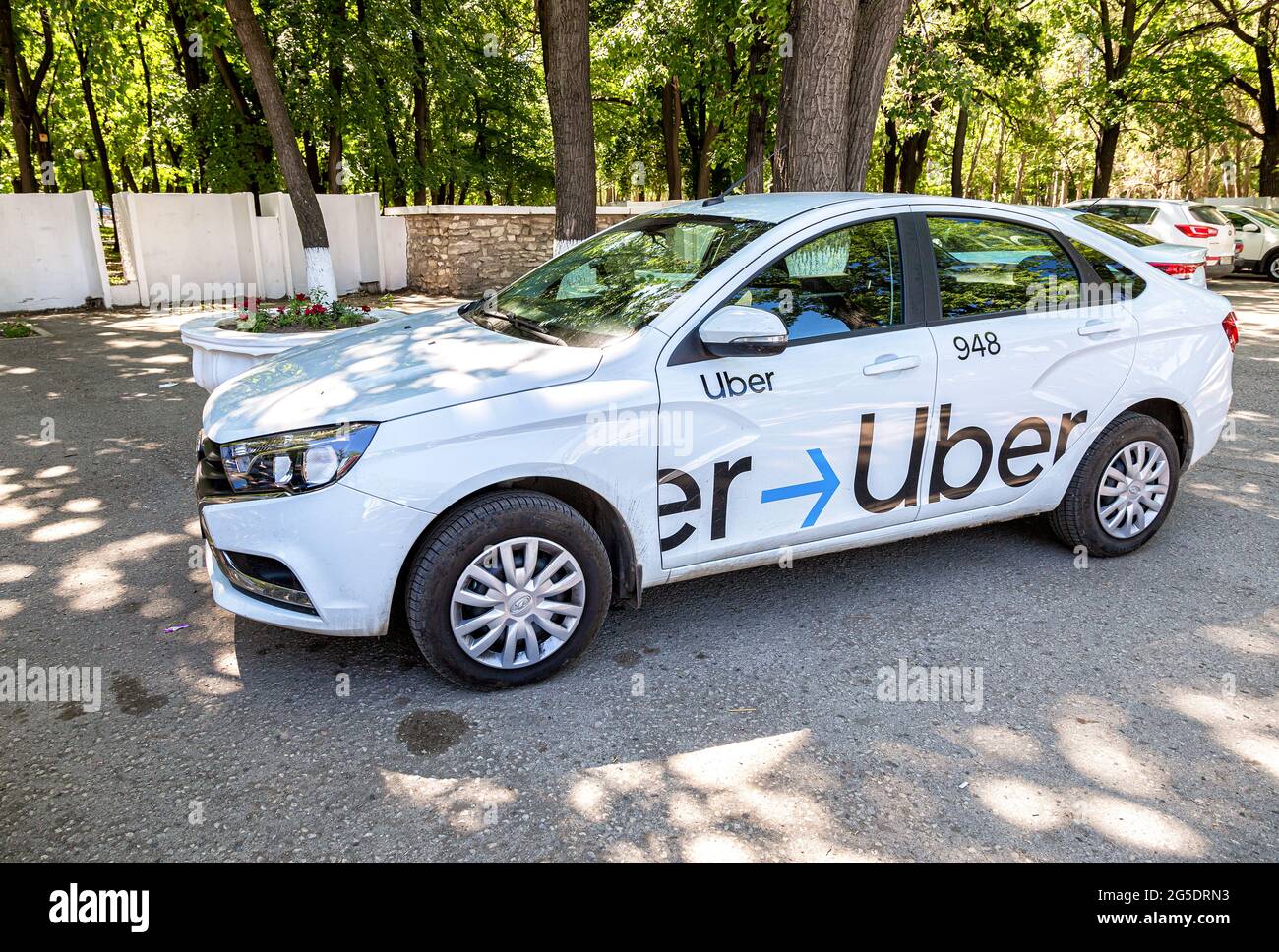 Samara, Russia - June 19, 2021: Uber taxi cab is parked on a city ...