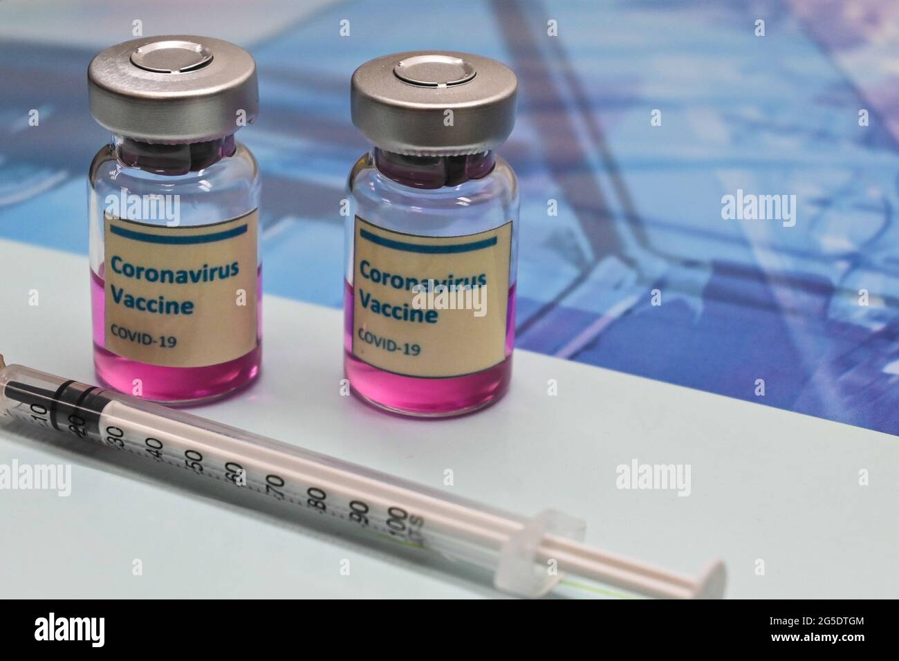 COVID-19 coronavirus vaccine trials. Vaccine bottle and label Stock ...