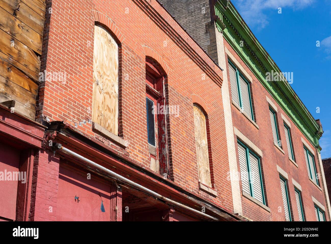 Old abandoned buildings and store fronts in Midwest city Stock Photo ...