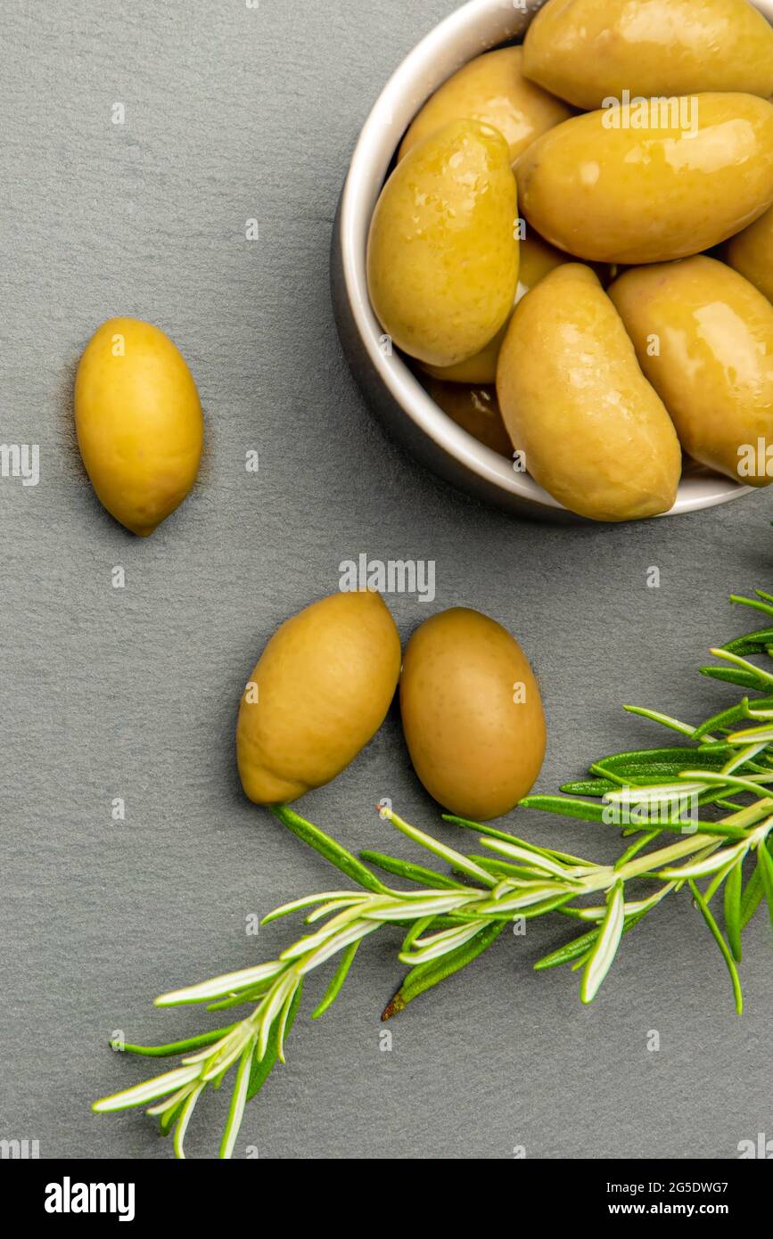 Green olives. Bella di cerignola Italian olives. Colored olives and a ...