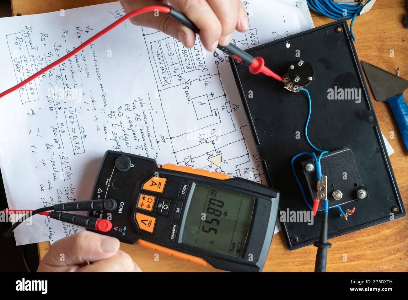 process of making electrical measurements with multimeter, testing the ...