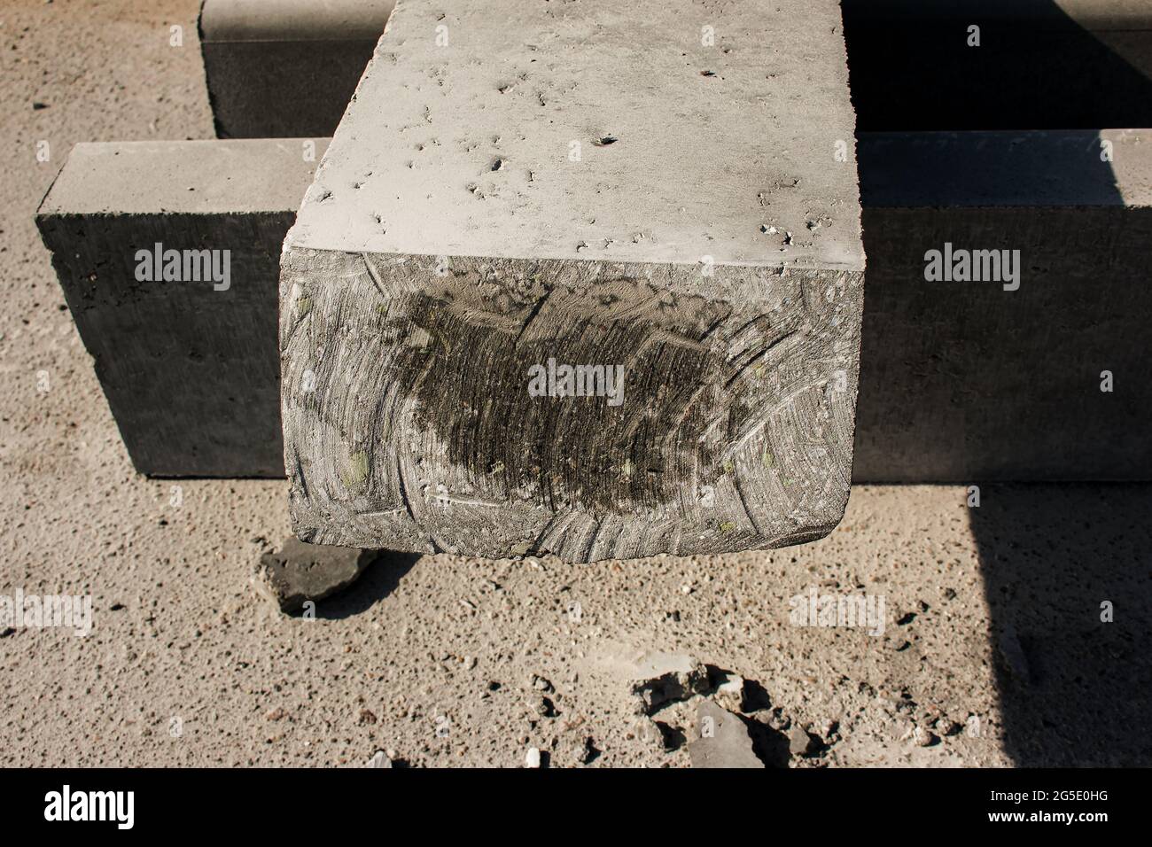 The process of laying the sidewalk curb. Concrete curb block after ...