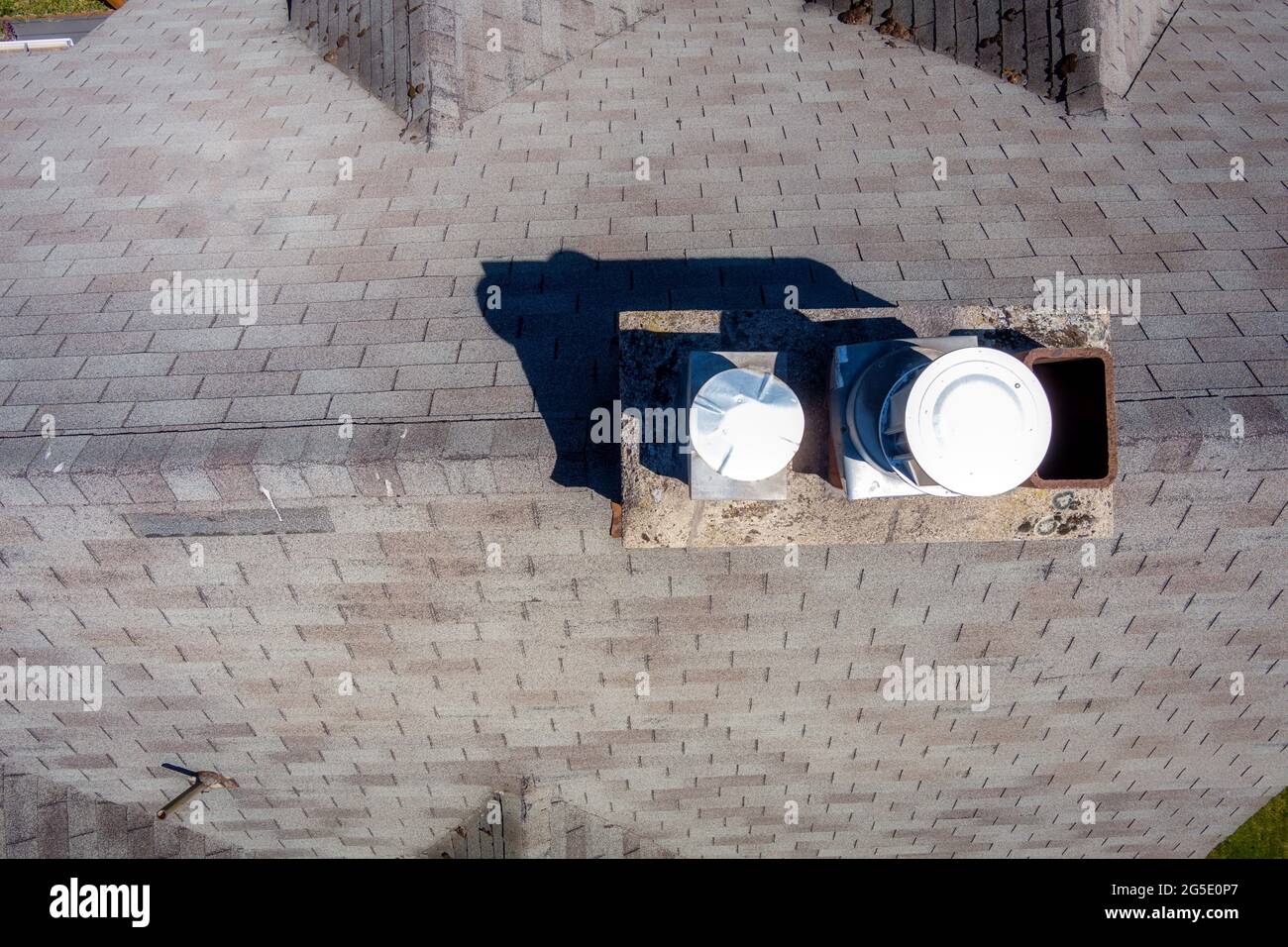 Old brick chimney looking down from above Stock Photo - Alamy