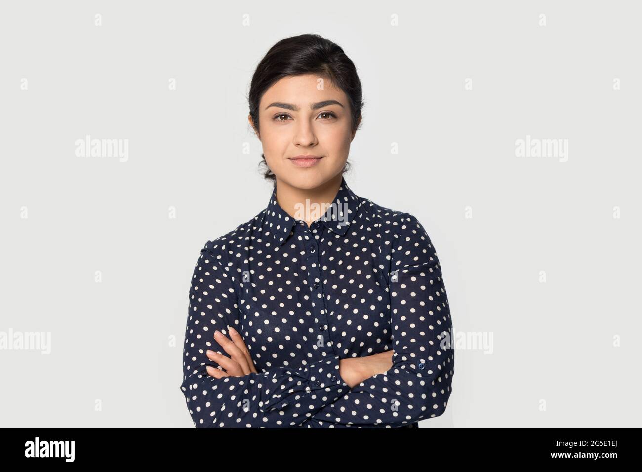 Portrait of young confident Indian woman pose on background Stock Photo ...