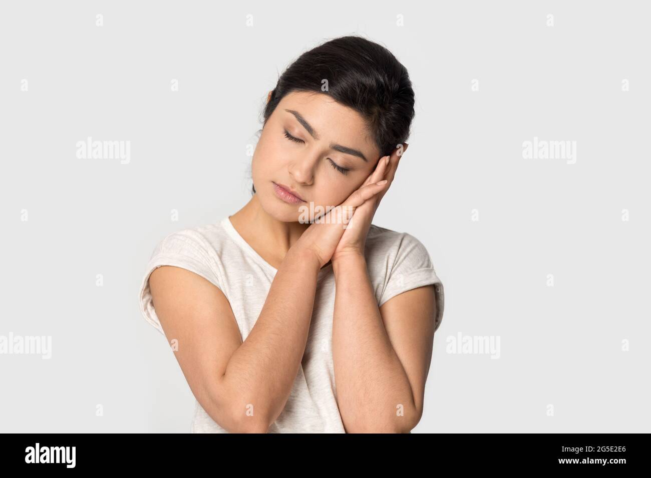 Tired Indian woman feel sleepy taking nap Stock Photo - Alamy