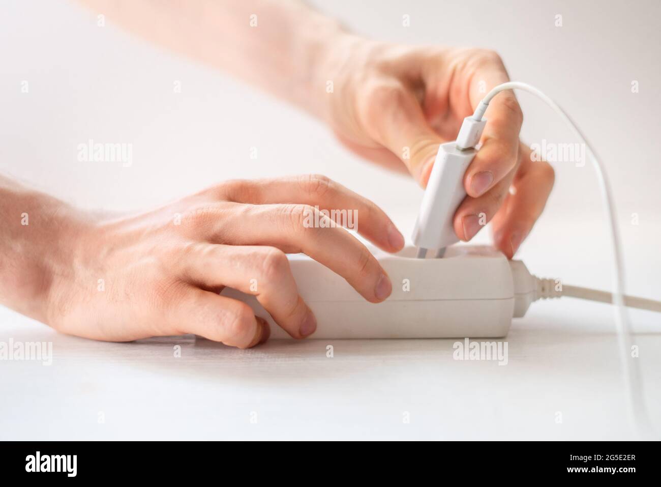 caution, hand insert the finger into the electricity socket, danger and ...