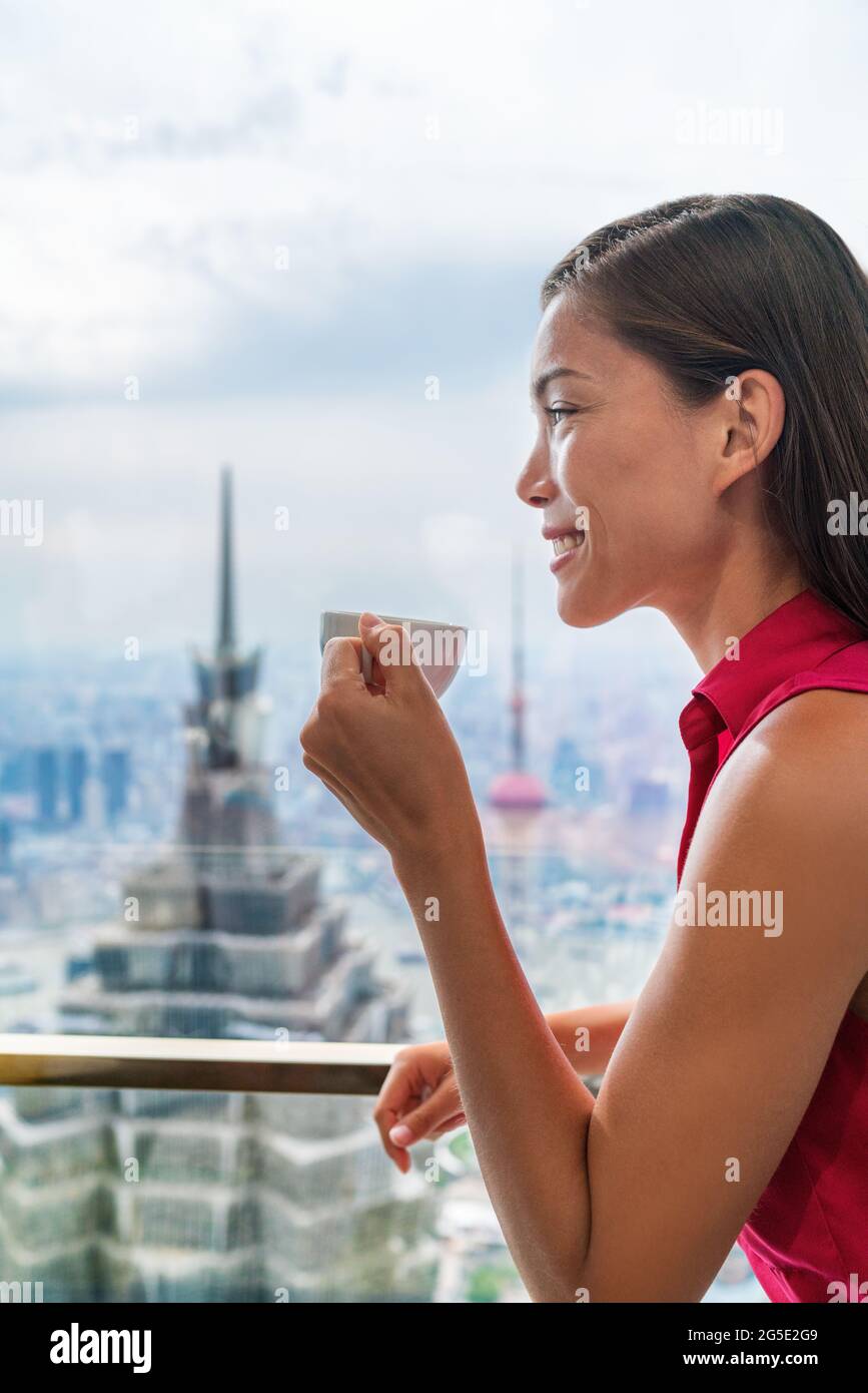 Woman enjoying afternoon tea hi-res stock photography and images - Alamy