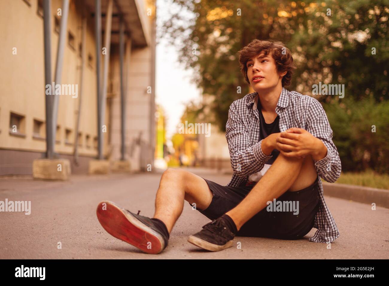 man on the ground, got injury outdoors, fall down Stock Photo - Alamy