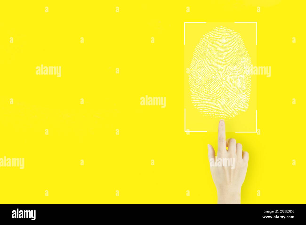 Password control through fingerprints. Young woman's hand finger ...